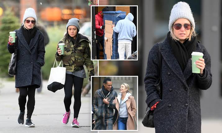 Amy Robach seen stopping by her marital home while movers clear out the ...