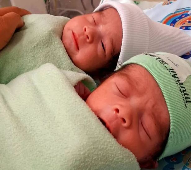 Incredible moment baby is born while still inside perfectly intact ...