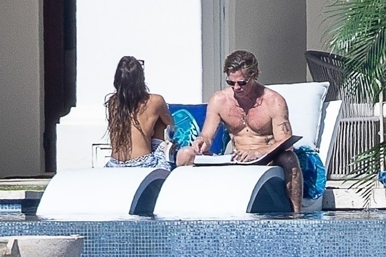 Shirtless Brad Pitt sunbathes with topless girlfriend Ines de Ramon (photos)