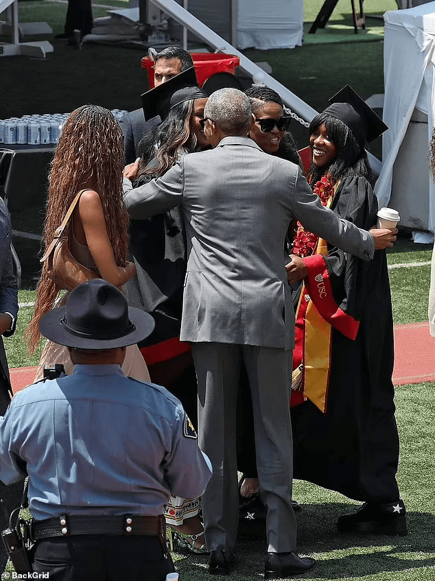 Barack and Michelle Obama watch daughter graduate from USC