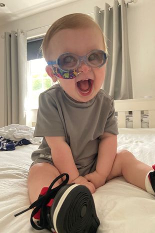 'My baby son's living in agony and unable to see but no-one can tell us ...