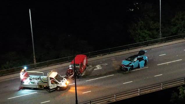 Six injured after crash between Lamborghini and Royal Mail van in London
