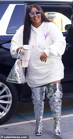 Singer Lizzo ALL SMILES as she hit the studio amid s_xual harassment ...