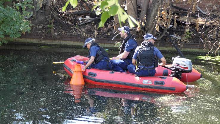 Woman's severed head and body FOUND in suitcase in canal as suspect ...