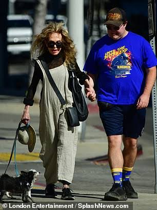 Former screen siren Dyan Cannon, 86, HOLDS hands with a male companion ...
