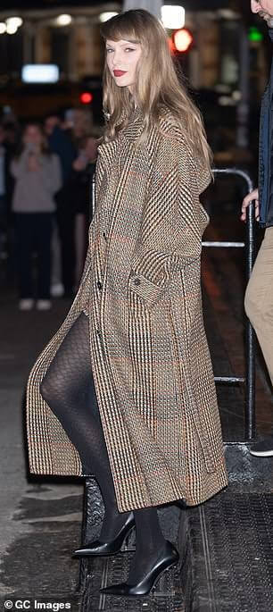 Taylor Swift is pretty in a FLIRTY plaid miniskirt and matching coat as ...