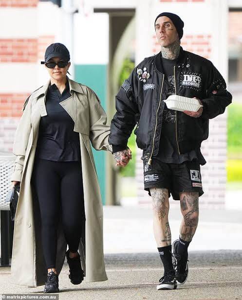 Kourtney Kardashian and Travis Barker HOLD hands in Brisbane after ...