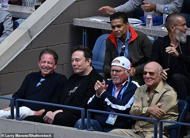 Tesla billionaire Elon Musk poses for selfies with tennis fans as he ...